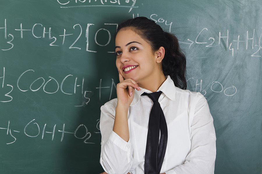 Smiling Teenage-Girl School Student Thinking Contemplation Standing In ...