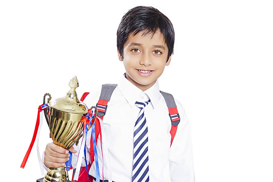 School Little-Boy Student holding Winning Trophy Award 1st Price ...