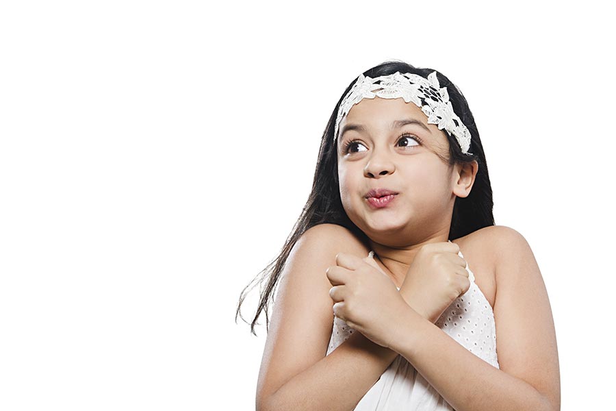 Little Girl shivering in cold Facial Expression Winter Season