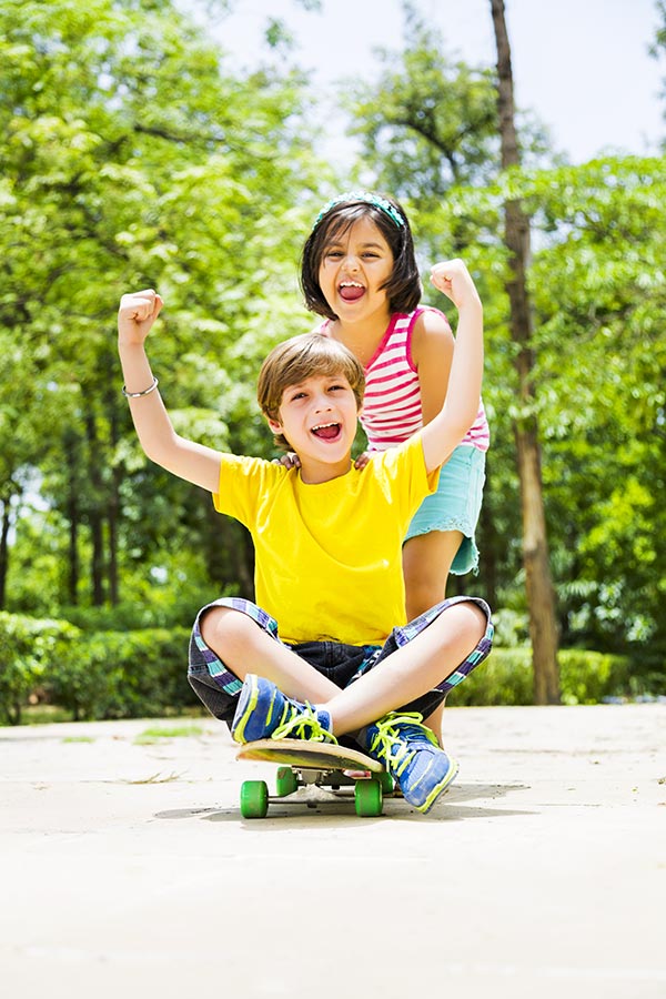 Two-Kids Boy Girl Friends skateboarding Playing having-Fun Cheerful in ...