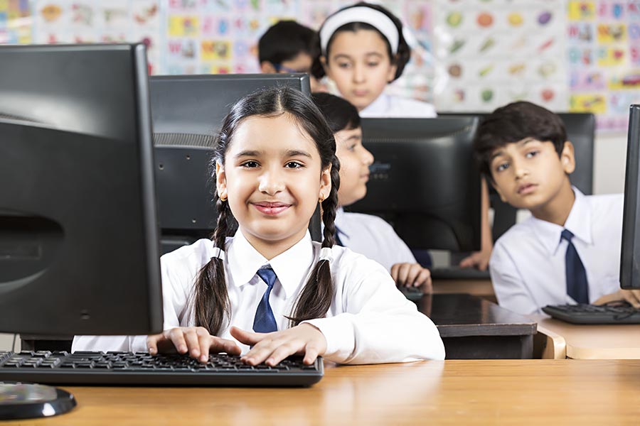 Indian Little Girl Computer School Student Studying E-Learning