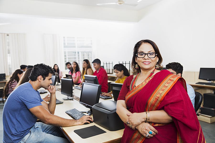 College Professor With Students Studying Computer E-Learning Eduation ...