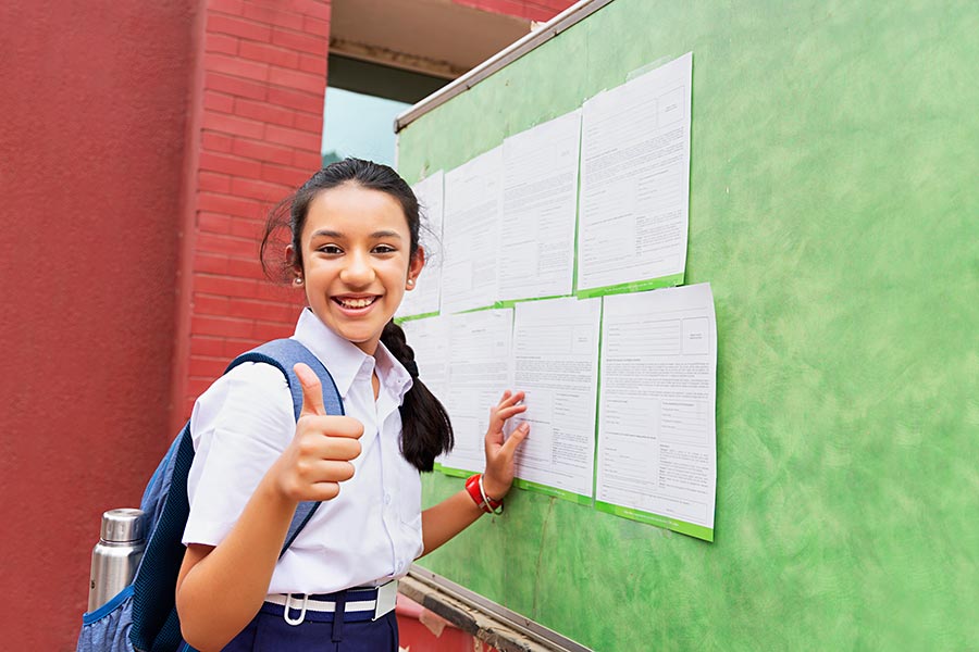 School girl Student Checking Exam-Result in-Noticeboard And Showing ...