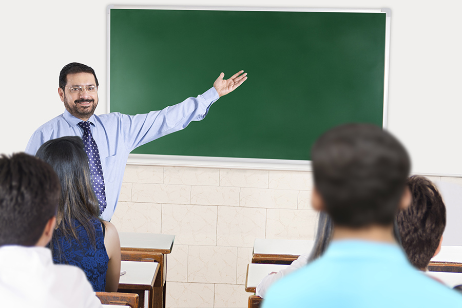 College Professor Teaching With students in-classroom Education-concept