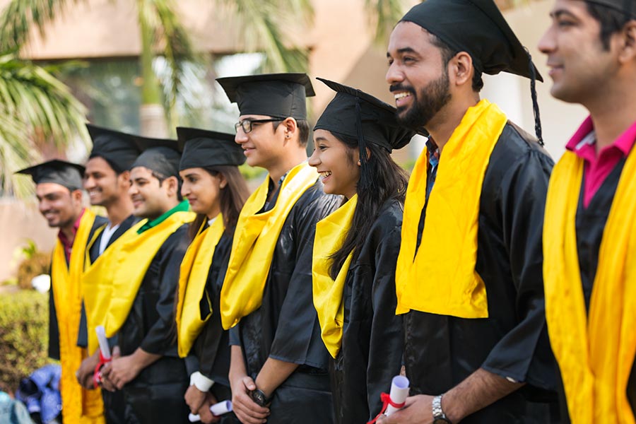 Group-of College Graduate Students Standing together Outdoors-on campus ...